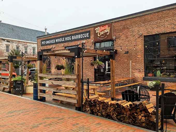 That massive pile of wood isn't just decoration, it's the secret ingredient to some of Maine's best barbecue.
