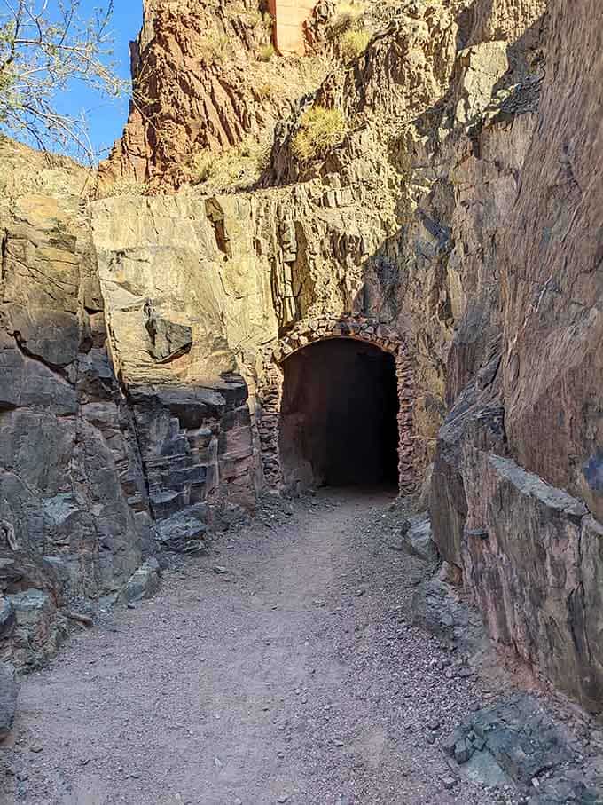 The tunnel entrance looks like a portal to another world, which isn't far from the truth down here.