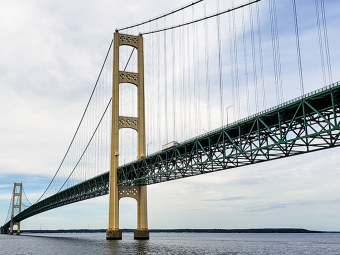 The distinctive ivory towers and suspended deck showcase the perfect marriage of engineering prowess and aesthetic beauty that defines the Mighty Mac.