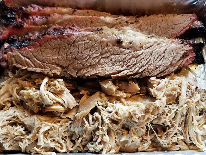 Brisket and Pulled Chicken: The yin and yang of barbecue &ndash; robust beef brisket paired with delicately smoked chicken that defies poultry expectations.