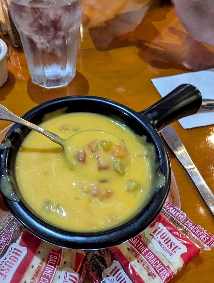 The legendary brew pub cheese soup &ndash; Wisconsin cheddar, smoked ham, and handcrafted beer combine in a bowl of Midwestern liquid gold.