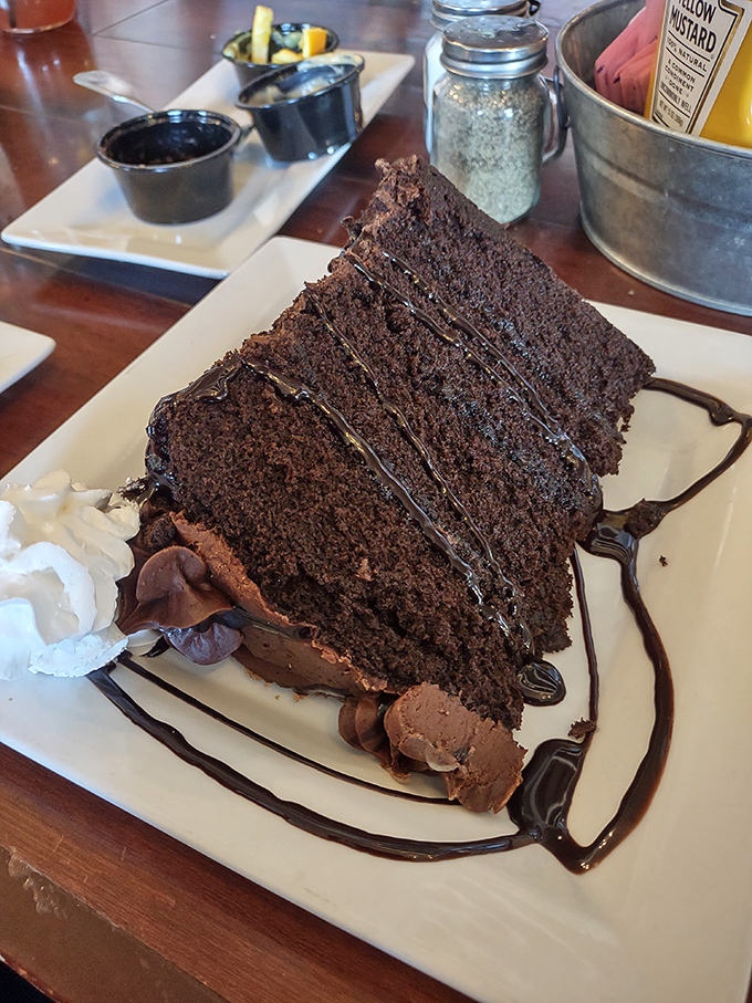 Chocolate cake so decadently rich it might actually resurrect the dead&mdash;three layers of moist perfection separated by silky frosting.