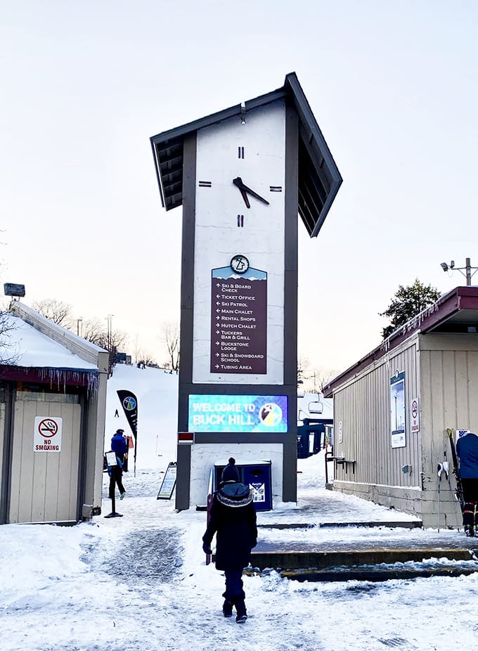 The clock tower stands sentinel over the park, though time seems to move differently when you're having this much fun.