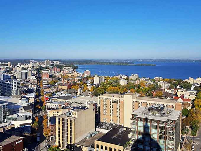 Coastal City Skyline Madison's skyline reflects in Lake Monona's waters, creating a double vision of urban beauty that changes with each passing season.