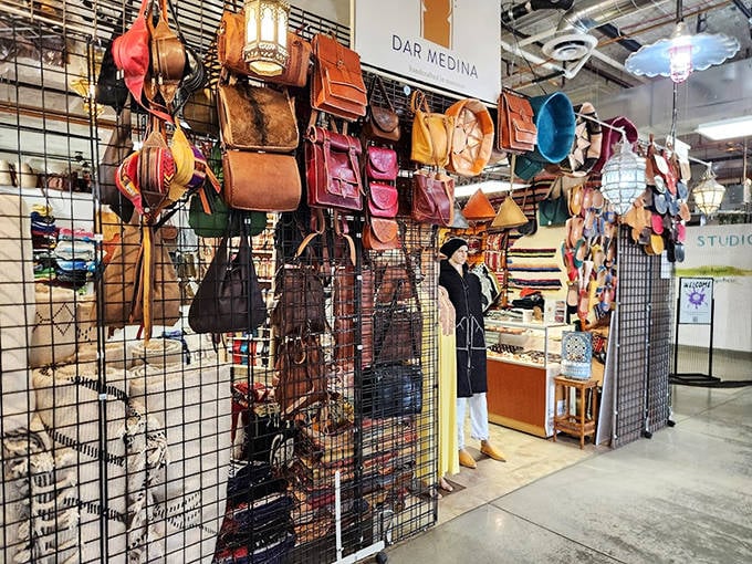 At Dar Medina, leather bags hang like exotic fruit, each one carrying the distinctive mark of artisanal craftsmanship.