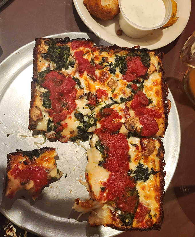 The ultimate comfort food showdown: pepperoni and mushroom on one side, supreme on the other – why choose when you can have both?