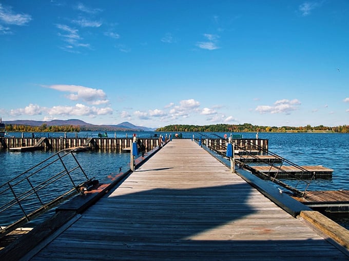A wooden dock extends like an invitation into the lake, promising fishing tales and sunset views worth remembering.
