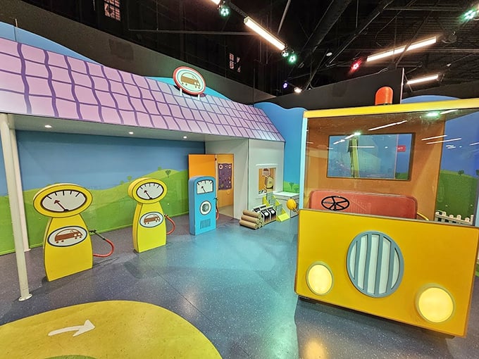 A mechanical playground where future engineers tinker with colorful tools, fixing imaginary problems with very real concentration.