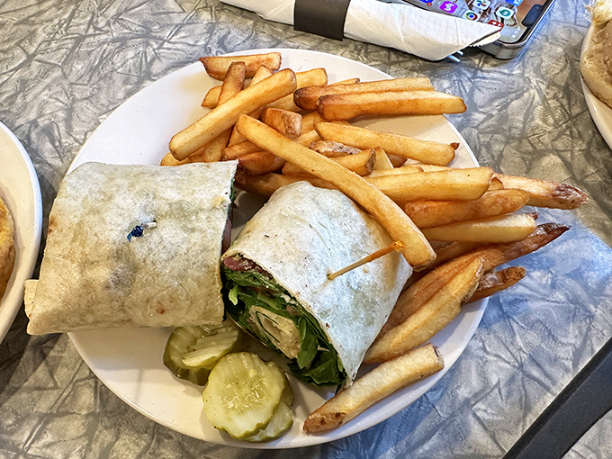 Fresh, wrapped perfection flanked by golden fries&mdash;proof that Henry's knows its way around lunch just as well as breakfast.