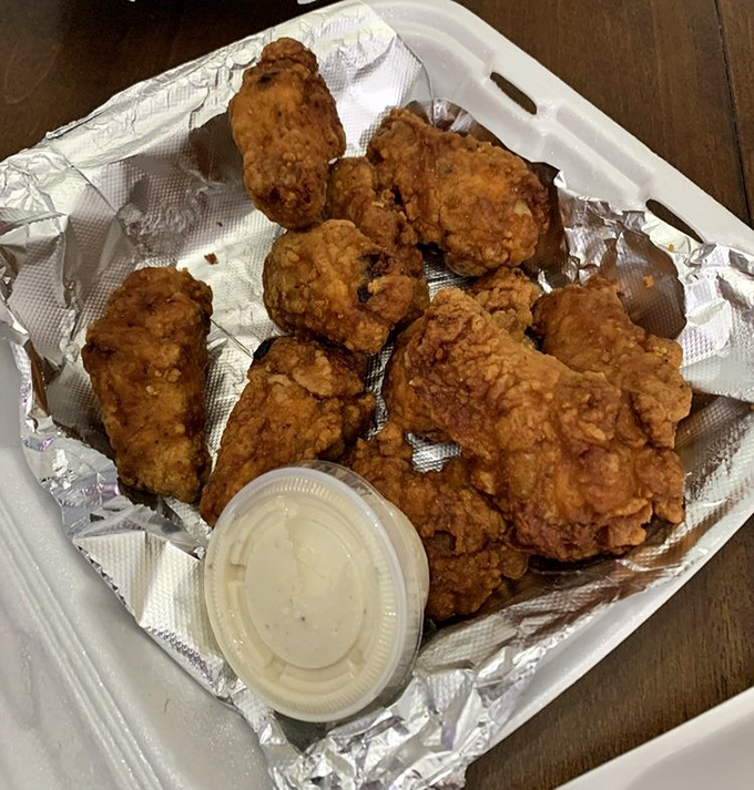 Golden-brown fried chicken that would make your grandmother proud – crispy outside, juicy inside, and worth every calorie.