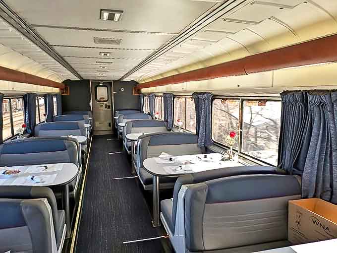 The dining car beckons with booth seating and picture windows, turning every meal into dinner theater with ever-changing scenery.