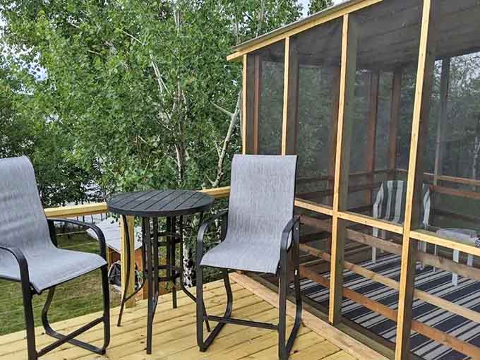 Comfortable deck seating positioned for optimal lake gazing means you'll finally understand what people mean when they say "room with a view."