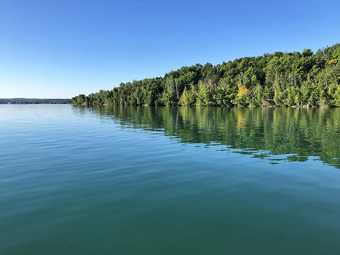 Fifty shades of blue! Elk Lake's remarkable clarity showcases underwater features with the precision of a natural aquarium.