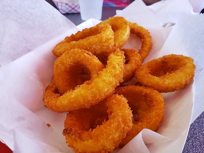 Crispy, golden onion rings that actually taste like onions, providing the perfect crunchy companion to your main event.