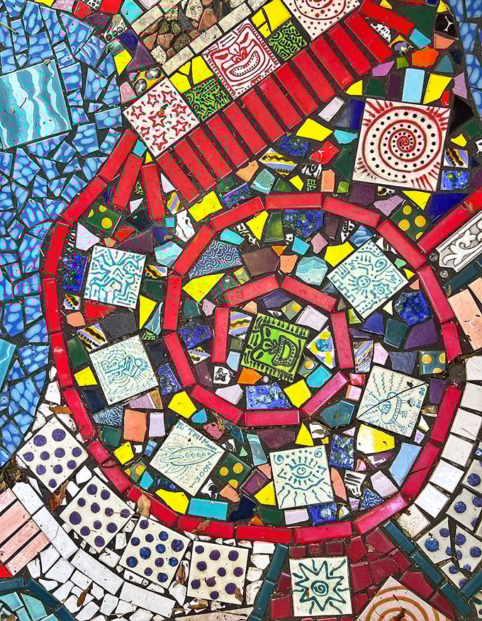 Intricate mosaic spirals pull your eye inward, each fragment telling part of a story that's both chaotic and perfectly balanced.