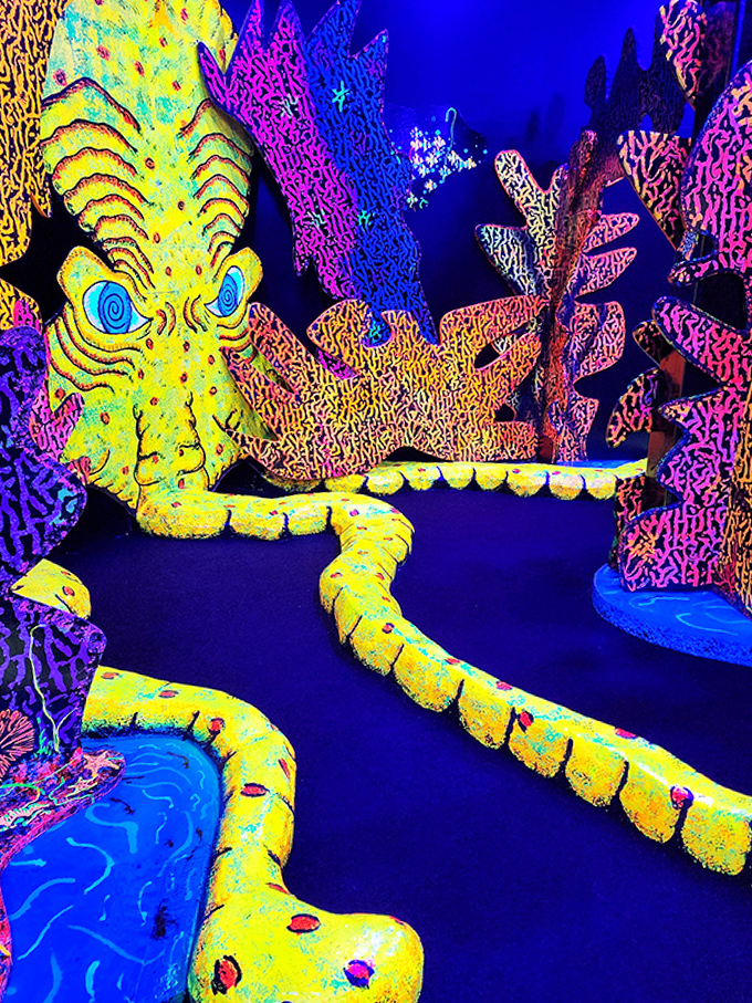 Dive into a neon dreamscape where fluorescent sea creatures glow like an 80s fever dream come brilliantly alive.