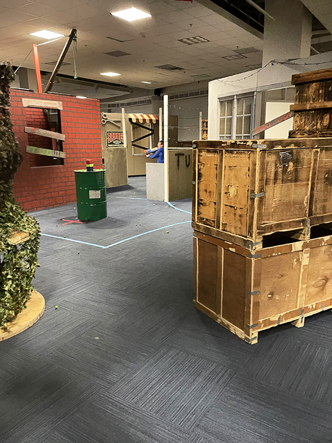 Between intense firefights, the facility's themed areas offer immersive environments that transport players from shopping mall to combat zone.