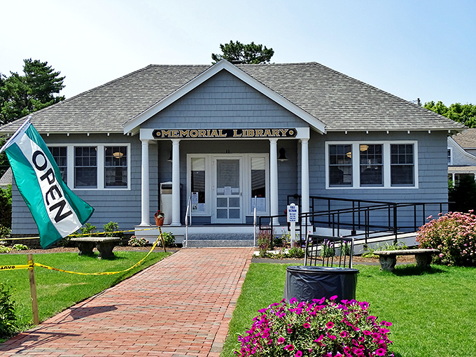 The Memorial Library stands as Ocean Park's literary heart, its welcoming porch and "OPEN" flag inviting visitors to lose themselves in stories.