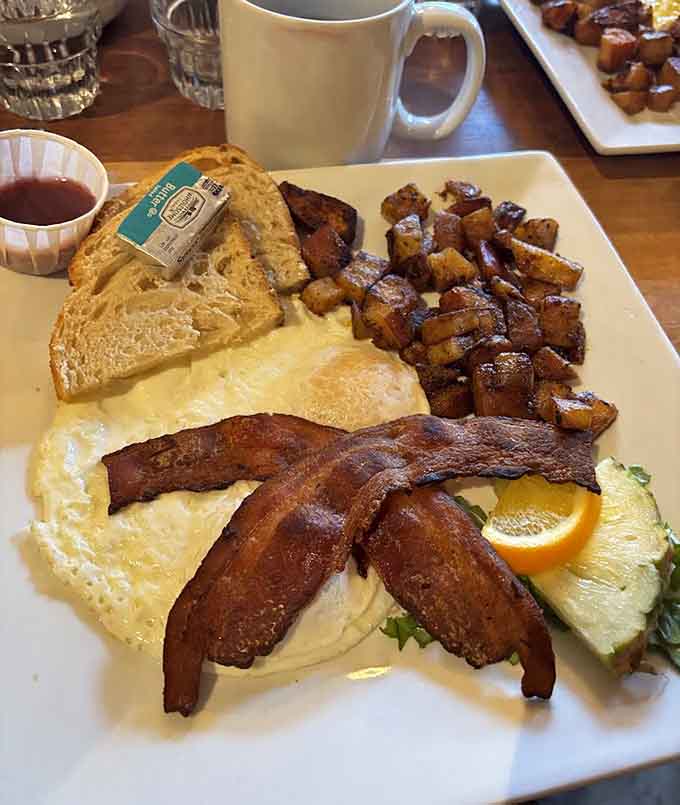 Breakfast plates showcase the kitchen's attention to detail, with perfectly cooked eggs, crispy bacon, and golden home fries.