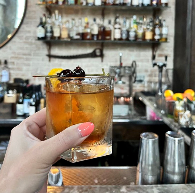 This isn't just an Old Fashioned &ndash; it's a time machine in a glass, with hand-carved ice that melts at precisely the right pace.