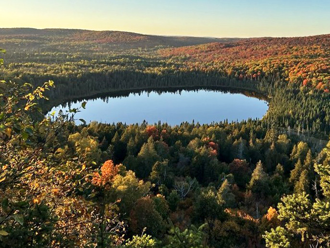 Perched above the wilderness, this overlook offers a panorama that makes smartphone cameras seem woefully inadequate.