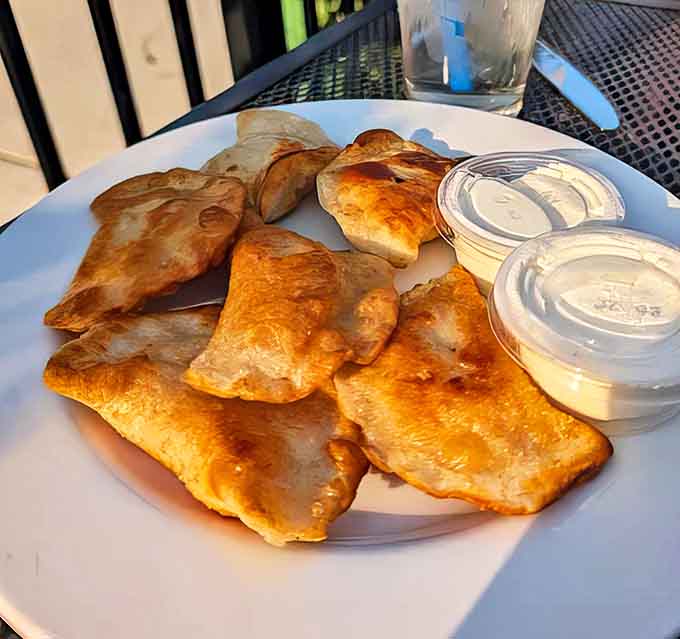 These handmade pierogi aren't just food; they're edible time machines transporting you straight to a Polish grandmother's kitchen.