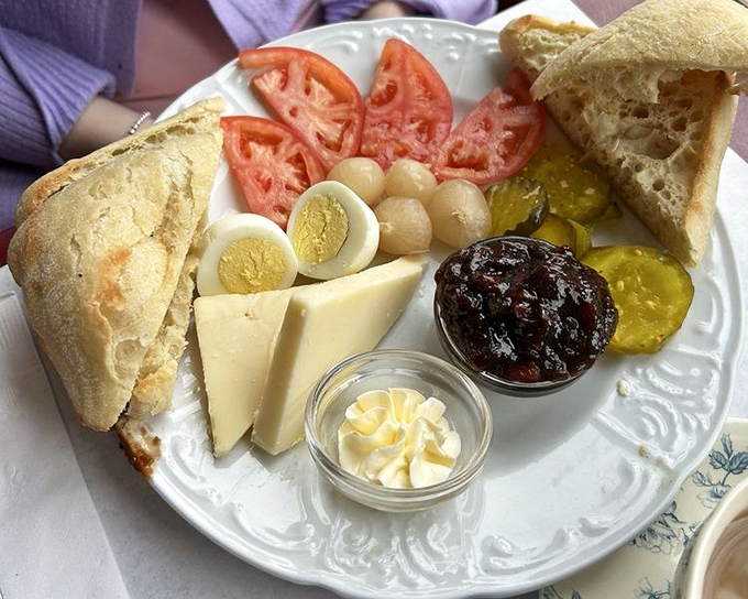 The Ploughman's Lunch: where rustic meets refined with crusty bread, sharp cheese, boiled eggs, and pickles &ndash; a farmer's feast fit for royalty.