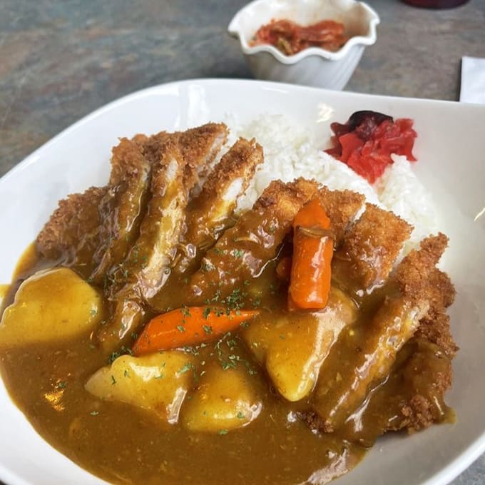 Pork katsu curry is Japanese-Hawaiian fusion at its finest, that golden cutlet swimming in curry gravy like it's found its true home.