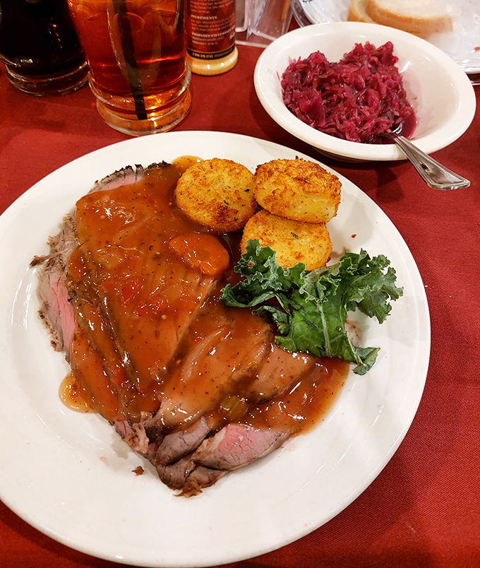 Tender beef swimming in a rich red wine sauce that would make any German grandmother nod in approval &ndash; fork-tender tradition on a plate.