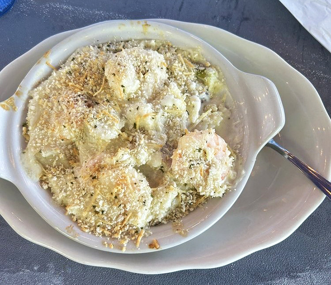 Seafood casserole that's basically Maine's ocean treasures having a party under a blanket of buttery, golden crumbs.