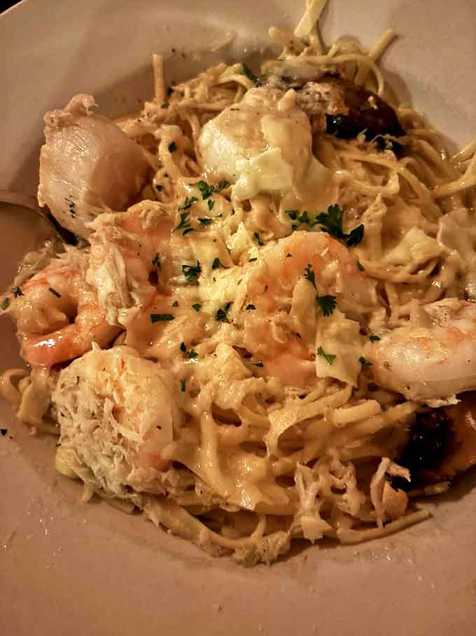 Seafood scampi that makes you question everything you thought you knew about pasta – shrimp, scallops and tender pasta swimming in buttery bliss.