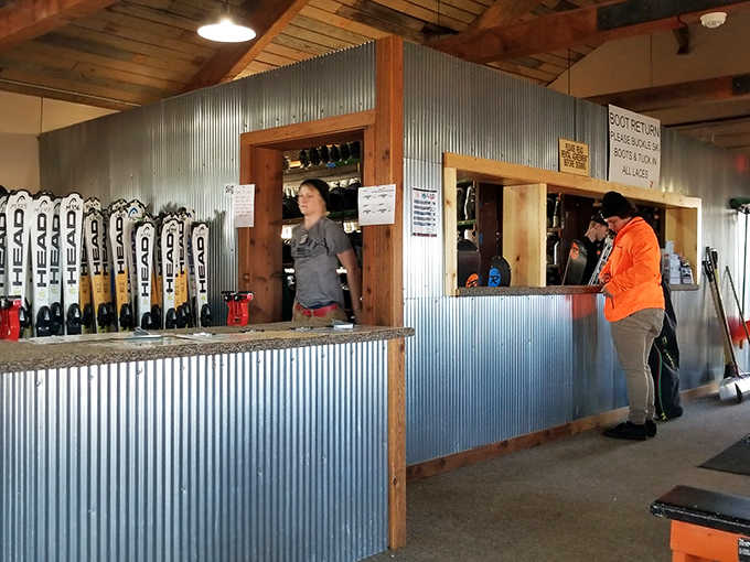 Ski rental facility: Where winter dreams begin and wallet fears are temporarily suspended &ndash; "Yes, I definitely need the premium package for my first time skiing!"