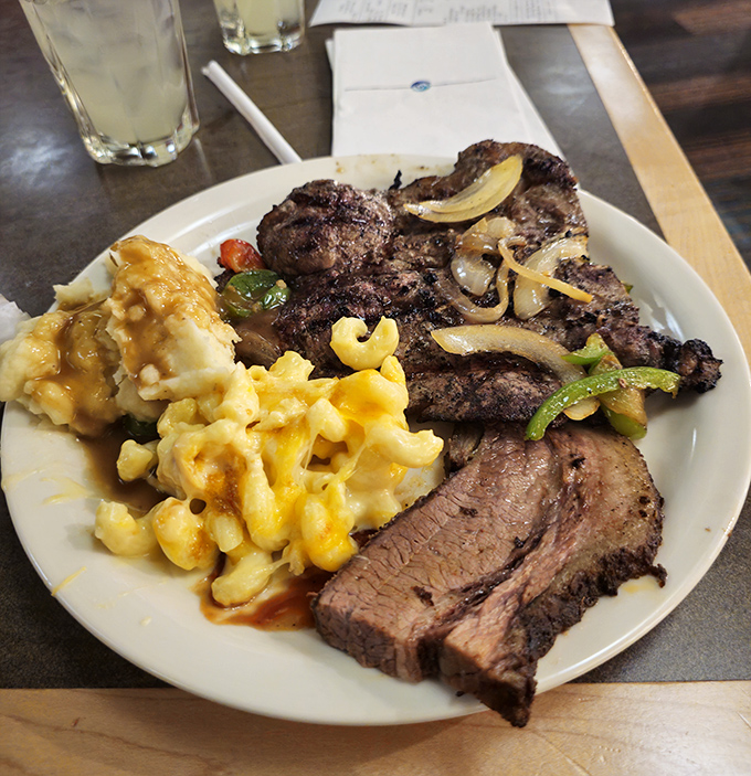 Carnivores rejoice! Perfectly cooked steaks and brisket share plate space with creamy mac and cheese – comfort food elevated to art form.