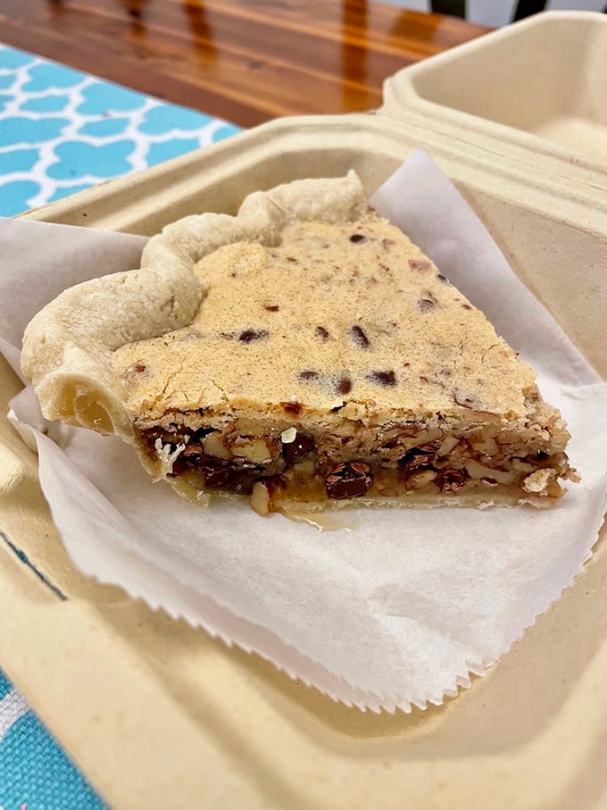 A pecan pie lover's dream with perfectly arranged nuts in a glistening filling. Southern tradition meets artisanal craftsmanship.