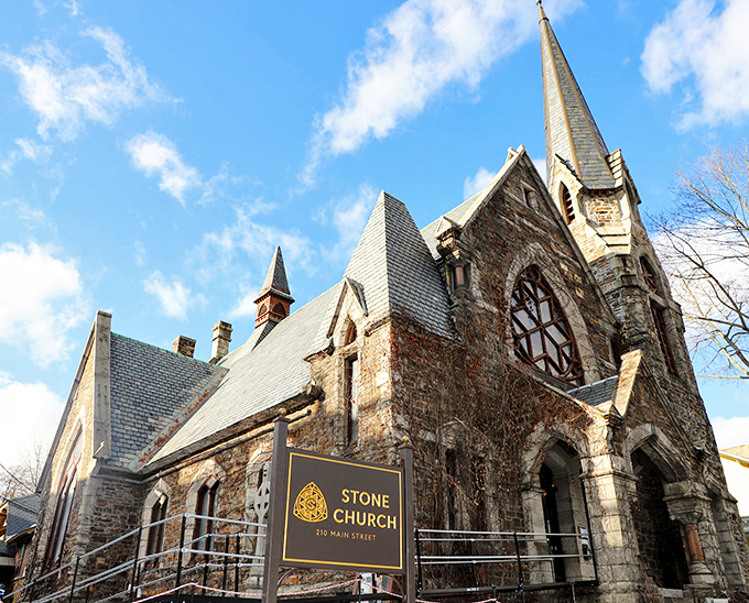 The Stone Church's Gothic architecture now hosts rock concerts instead of sermons, proving that sacred spaces can evolve while maintaining their ability to move souls, just with better amplification.