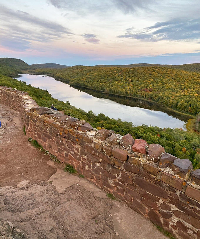 The ridges frame this river valley like a masterpiece in nature's gallery, proving that the best art never needs a museum.