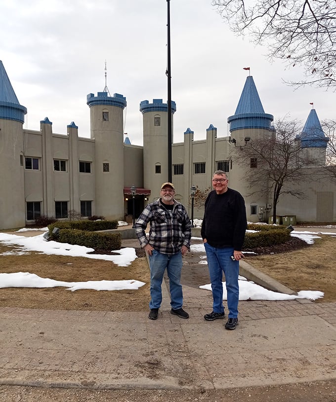 Visitors gather to share their castle experience, swapping stories of discovery while standing before Michigan's most surprising architectural treasure.