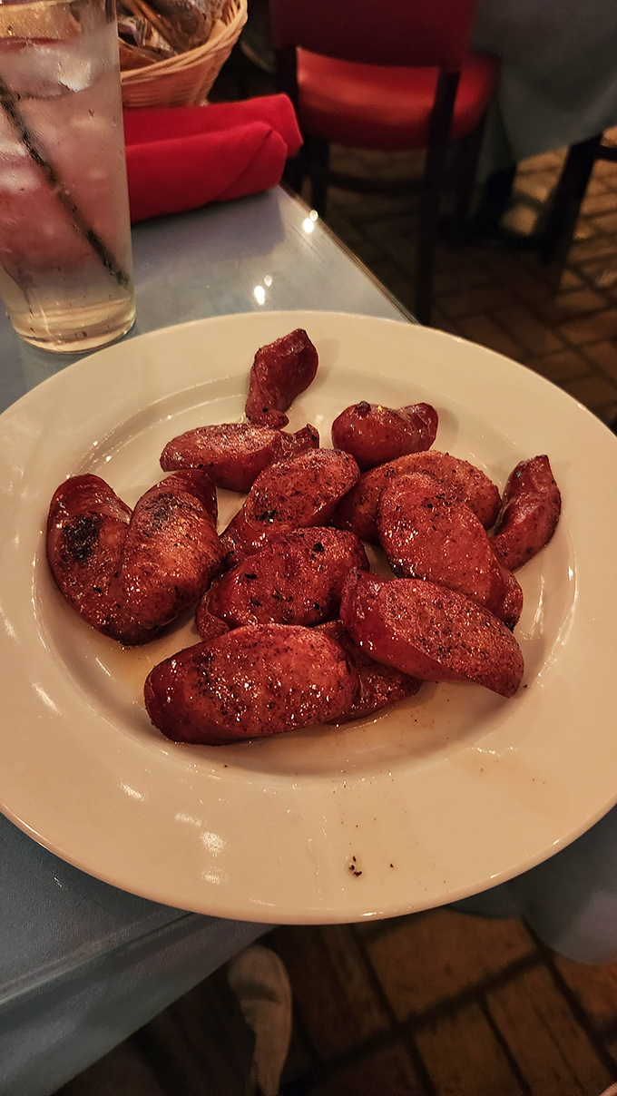 Pan-fried kielbasa with a perfect snap and caramelized exterior, proving that sometimes the simplest preparations yield the most satisfying results.