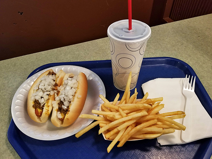 The classic Coney setup with crispy fries and a cold drink never goes out of style, no matter what year it is.
