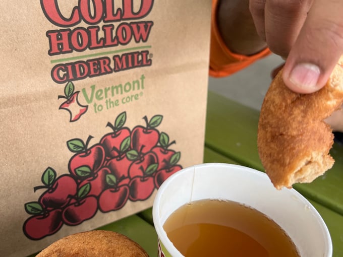 The perfect pairing: a warm cider donut meets its liquid counterpart in a match made in Vermont heaven.