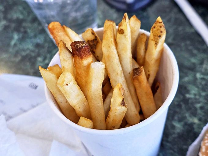 These golden french fries are crispy perfection, the ideal sidekick to any burger and proof that simple done right beats fancy every time.
