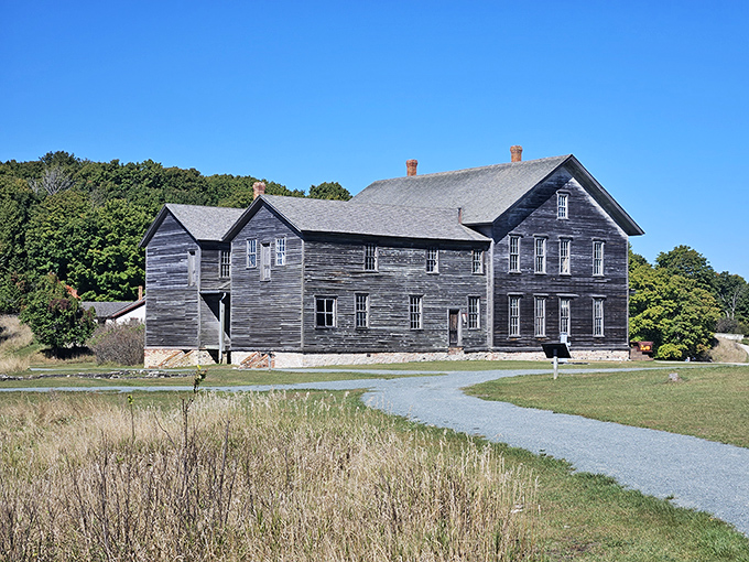 The historic Fayette Hotel, where travelers and company officials once rested, now stands as a weathered testament to small-town hospitality.