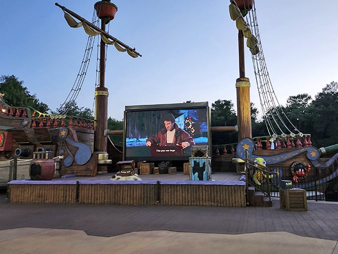 Movie magic happens here! The pirate ship transforms into an outdoor cinema where families create memories under the stars.