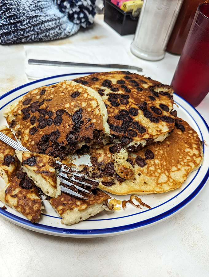 Chocolate chip pancakes with that perfect diner balance: crispy edges giving way to a fluffy interior, with melty chocolate in every other bite.