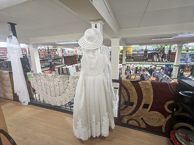 A vintage wedding dress stands sentinel among formal wear options &ndash; something borrowed, something thrifted, something absolutely gorgeous.