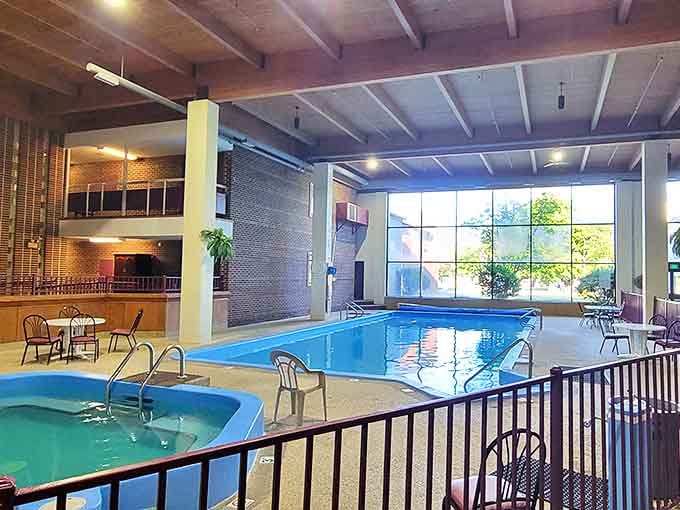 The indoor pool area offers year-round recreation regardless of Michigan's weather, a bright oasis for families and weary travelers alike.