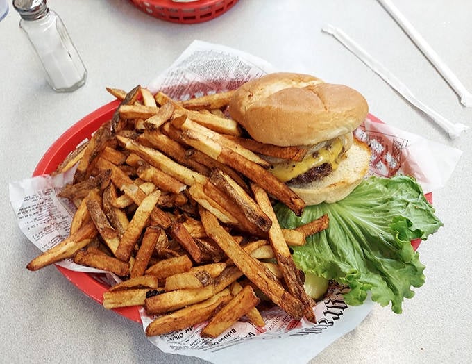 The California Burger with its fresh toppings shares the spotlight with golden fries that deserve their own fan club.