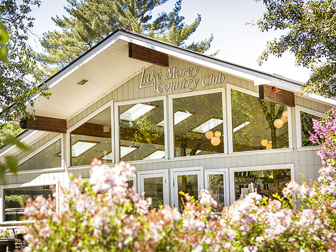 Lake Morey Country Club: Sunlight streams through expansive windows, promising golf tales and laughter over post-round refreshments.