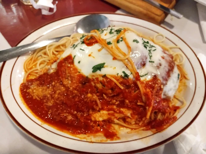Spaghetti that would make an Italian grandmother nod in approval &ndash; simple, hearty, and smothered in a sauce that's clearly simmered with patience.