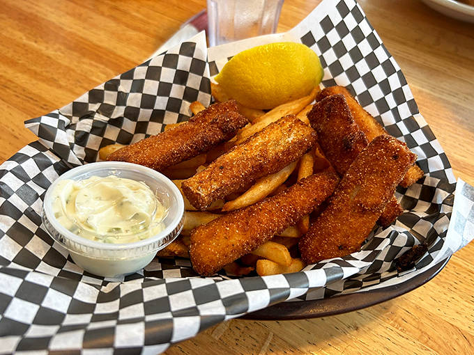 Golden-fried walleye that would make any angler proud, served with fries so perfectly seasoned they deserve their own fan club.